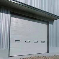 China Strong Panel Construction Heavy Duty Industrial Door For Manufacturing Plant Loading Bays for sale