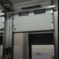 China Strong Panel Construction Heavy Duty Industrial Door For Manufacturing Plant Loading Bays for sale
