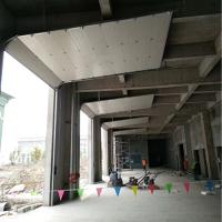 China 0.2-0.4m/s Speed Industrial Sectional Overhead Door Including Dock Seal For Express Delivery Hubs for sale