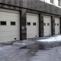 China Automatic Manual Customized Industrial Sectional Door For Freight Forwarding Warehouses for sale