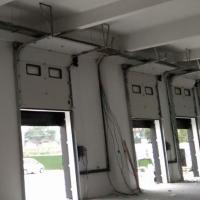 China Strong-Durability High-Speed Industrial Sectional Overhead Door For Logistics Operations for sale