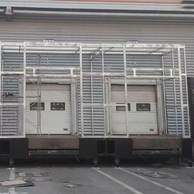 China Reliable-Performance Industrial Sectional Overhead Door For Third-Party Logistics Facilities for sale