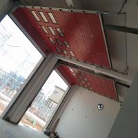 China Reliable-Performance Industrial Sectional Overhead Door For Third-Party Logistics Facilities for sale