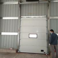 China Excellent Thermal-Insulation Industrial Sectional Overhead Door For General Storage Warehouses for sale