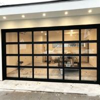 China Premium Glass Garage Doors For Car Showrooms Modern Design Visibility Smart Operation for sale