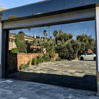 China Customizable Quiet Motor System Smart Garage Door For Home Automation for sale