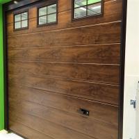 China Modern Designed Automatic Steel Sectional High Speed Garage Door Windproof for sale
