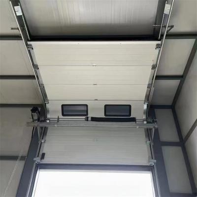 China Color-Coated Steel Heavy-Duty Industrial Sectional Overhead Door For Facility Main Entrances for sale