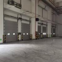 China 0.3-0.6mm Color-Coated Steel Industrial Sectional Overhead Door For Logistics Transit Warehouses for sale