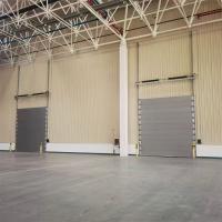 China 0.3-0.6mm Color-Coated Steel Industrial Sectional Overhead Door For Logistics Transit Warehouses for sale