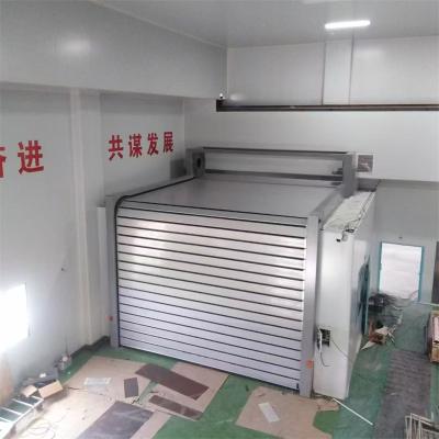 China Smooth-Operation Industrial Sectional Overhead Door For Assembly Workshop Environments for sale