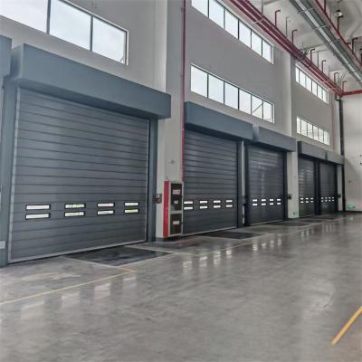 China Heavy-Duty Rigid Aluminum Insulated-Panel Spiral High Speed Door Industrial Access System for sale