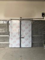 China Double Sliding Electric Cold Storage Door 150mm Insulated Panels For Wide Cold Room Openings for sale