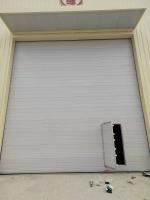 China Flexible Lift Configuration Industrial Sectional Overhead Door for High-Ceiling Warehouses with Wind Resistance Level 7-8 for sale