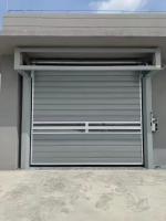 China Beaufort 10 Wind Resistance Spiral High Speed Door with Rigid Aluminum Panels and 40mm Insulated Panels for sale