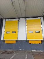 China Space-Saving Vertical-Opening Industrial Sectional Overhead Door with 24dB Sound Insulation for Mezzanine Loading Zones for sale
