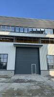 China Integrated Pedestrian Door Industrial Sectional Overhead Door with Wind Resistance Level 7-8 and Sound Insulation 24dB for High-Traffic Warehouses for sale