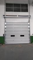 China Custom-Size Configurable Industrial Sectional Overhead Door with 24dB Sound Insulation and Level 7-8 Wind Resistance for sale