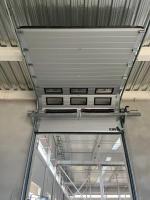 China Custom-Size Configurable Industrial Sectional Overhead Door with 24dB Sound Insulation and Level 7-8 Wind Resistance for sale