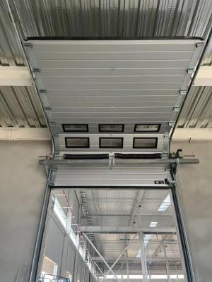 China Custom-Size Configurable Industrial Sectional Overhead Door with 24dB Sound Insulation and Level 7-8 Wind Resistance for sale