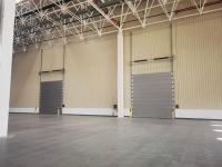 China Custom-Size Configurable Industrial Sectional Overhead Door for Non-Standard Workshop Openings with 24dB Sound Insulation for sale