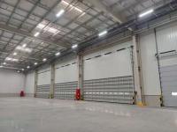 China Flexible Lift Configuration Industrial Sectional Overhead Door for High-Ceiling Warehouses with Wind Resistance Level 7-8 for sale