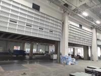 China Flexible Lift Configuration Industrial Sectional Overhead Door for High-Ceiling Warehouses with Wind Resistance Level 7-8 for sale