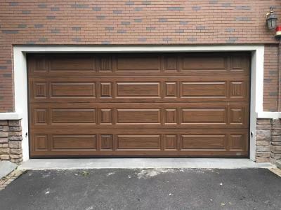 China Insulated Sectional Garage Door with 40 mm Polyurethane Insulated Panels and Durable Multi-Layer Coated Finish for Outdoor Use for sale