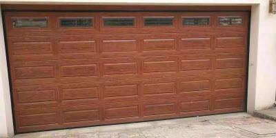 China Insulated Sectional Garage Door with 40 mm Polyurethane Insulated Panels and Multiple Panel Design Options for sale