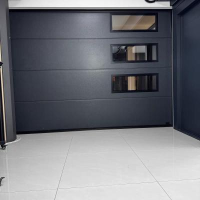China Insulated Sectional Garage Door with Weight-Matched Extension Spring and 40 mm Polyurethane Insulated Panels for sale