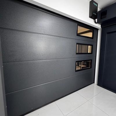 China Insulated Sectional Garage Door with Rubber Sealed Panel Joints and 40 mm Polyurethane Insulated Panels Featuring 1.5 mm Embedded Steel Reinforcement for sale