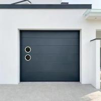 China Reinforced Insulated Sectional Garage Door with 1.5 mm Embedded Steel Plate and ± 0.5 mm Panel Straightness for Heavy Daily Use for sale
