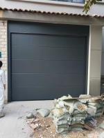 China Reinforced Insulated Sectional Garage Door with 0.5 mm Straightness Tolerance and 1.5 mm Steel Reinforcement for sale