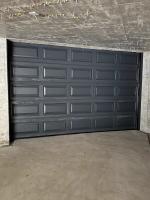 China Reinforced Insulated Sectional Garage Door with 0.5 mm Straightness Tolerance and 1.5 mm Steel Reinforcement for sale