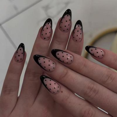 China Almond Pattern Press On Nails Black And Pink Polka Dot Nails French Tip for sale
