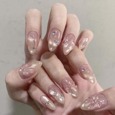 China Floral Rhinestone 3D Press On Nails Pink Shimmer Ombre Nails Long Almond for sale