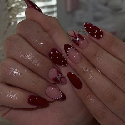 China FDA Long Almond Polka Dot Nails Finish Vintage Rhinestone 3D Nails Bow Design for sale