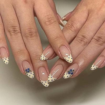 China Cute Blueberry French Tip Press On Nails Nude Almond White with Black Polka Dots for sale