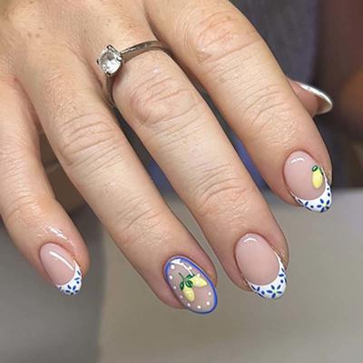 China Blue Floral Pattern Press On Nails Short Round Fake Nails With Yellow Flower for sale