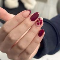 China Burgundy Red Pattern False Nails Medium Oval Autumn Fake Nails for sale