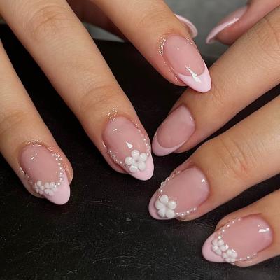 China Almond Pink French Tip False Nails 3D White Flower Pearl Glossy for sale