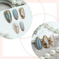 China Cat Eyes 3D Press On Nails Gold Leaf Floral Pearl Shell Charm Manicure Tips for sale