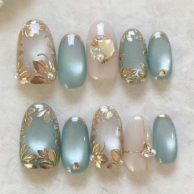 China Cat Eyes 3D Press On Nails Gold Leaf Floral Pearl Shell Charm Manicure Tips for sale
