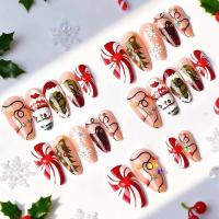 China Wholesale Hand Painted Grinch Christmas Holiday Fake Nails Almond Nude Cartoon for sale