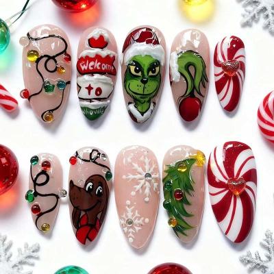China Wholesale Hand Painted Grinch Christmas Holiday Fake Nails Almond Nude Cartoon for sale