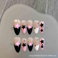 China Bulk Handmade Fake Nails Almond Nude Base Black Pink Star French Nails for sale
