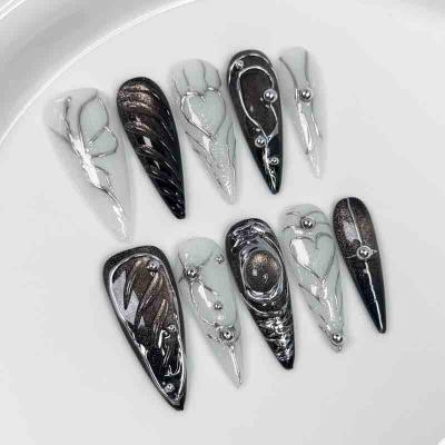 China Cat Eyes Handmade Fake Nails Long Stiletto Silver Line Heart Wing Metal for sale