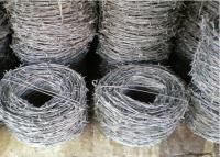 China Low Carbon Steel 7.5cm SWG18 Coiled Barbed Wires for sale