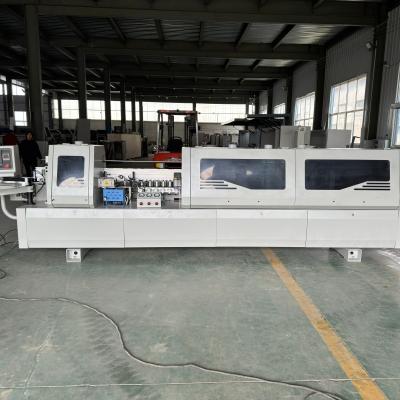 China 9-Function Auto Edge Banding Machine 13.5KW Power for 10-60mm Wood Panels with 18-24m/min Speed for sale