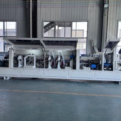 China Automatic Edge Banding Machine for Woodworking 10-60mm Plate Thickness 18-24m/min Conveyor Speed for sale